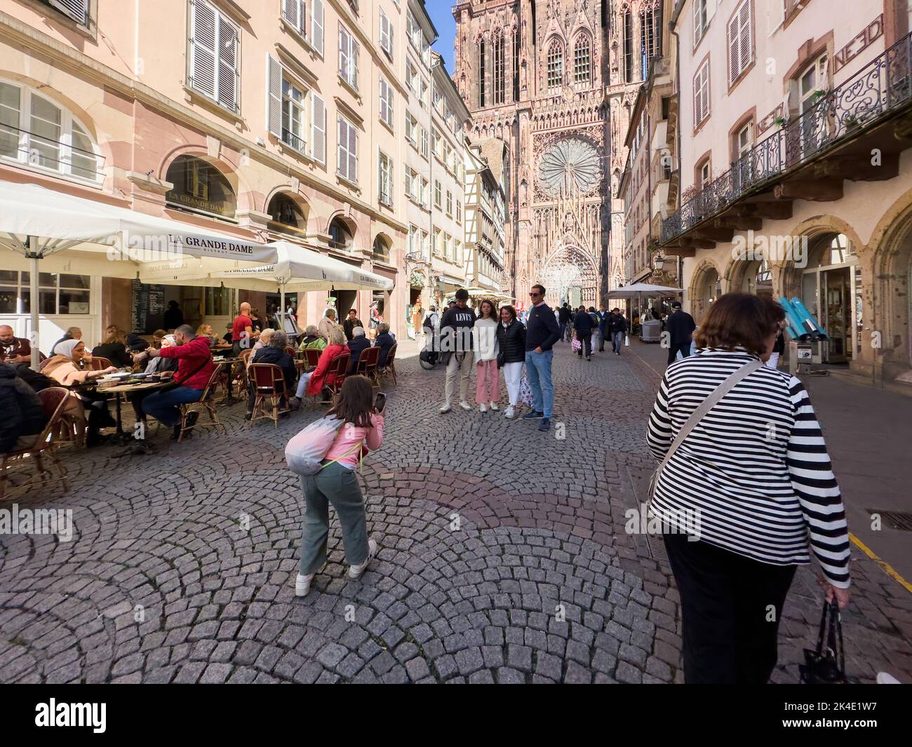 Strasbourg, France Sep 21, 2022: Young girl taking photos of group ...