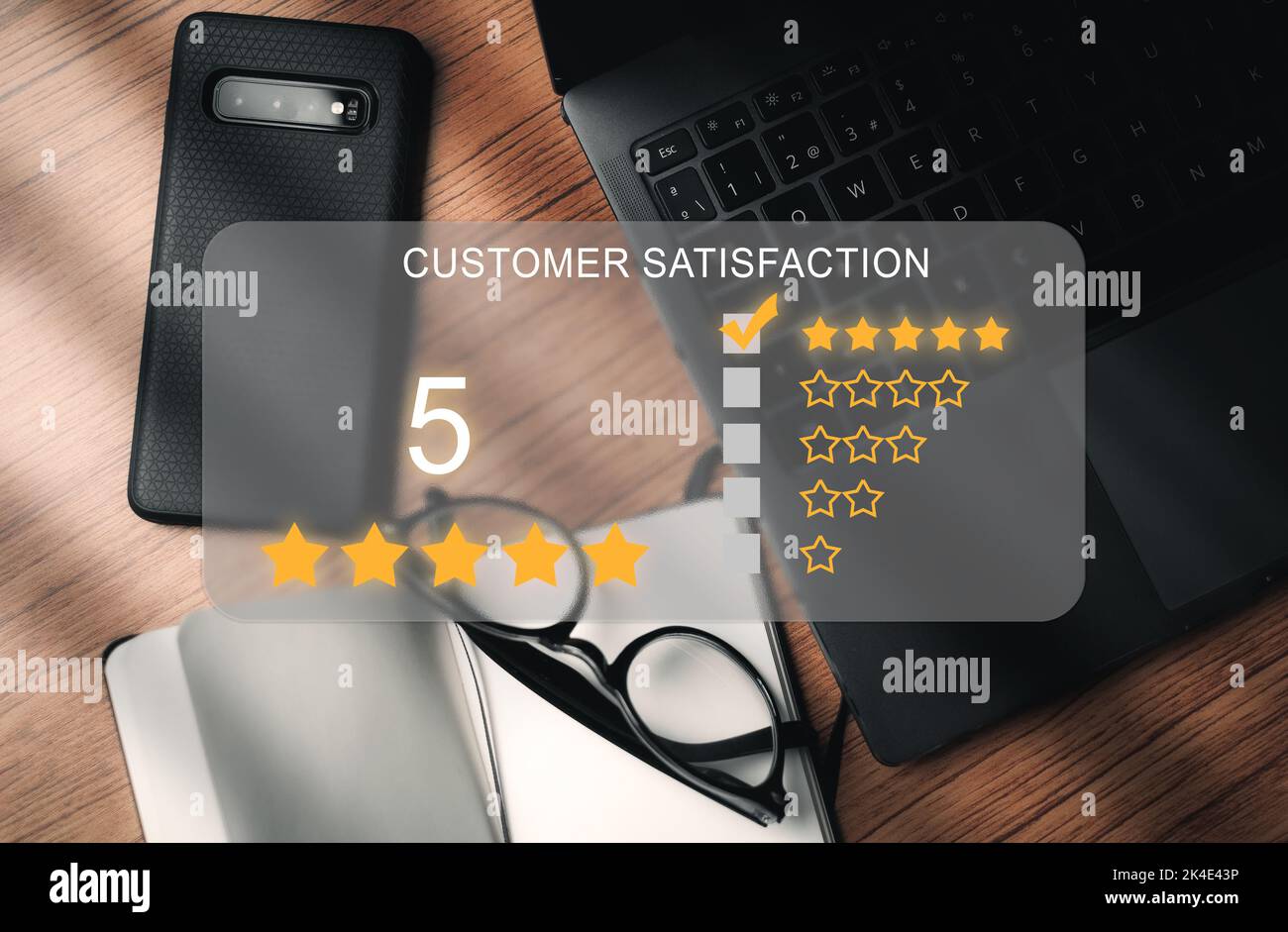 Top desk as background with VR screen for rating a service. Customer ...