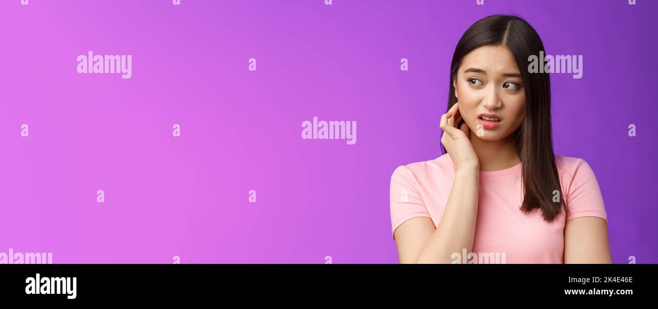 Insecure anxious young timid asian girl feel nervous scared, scratch ...