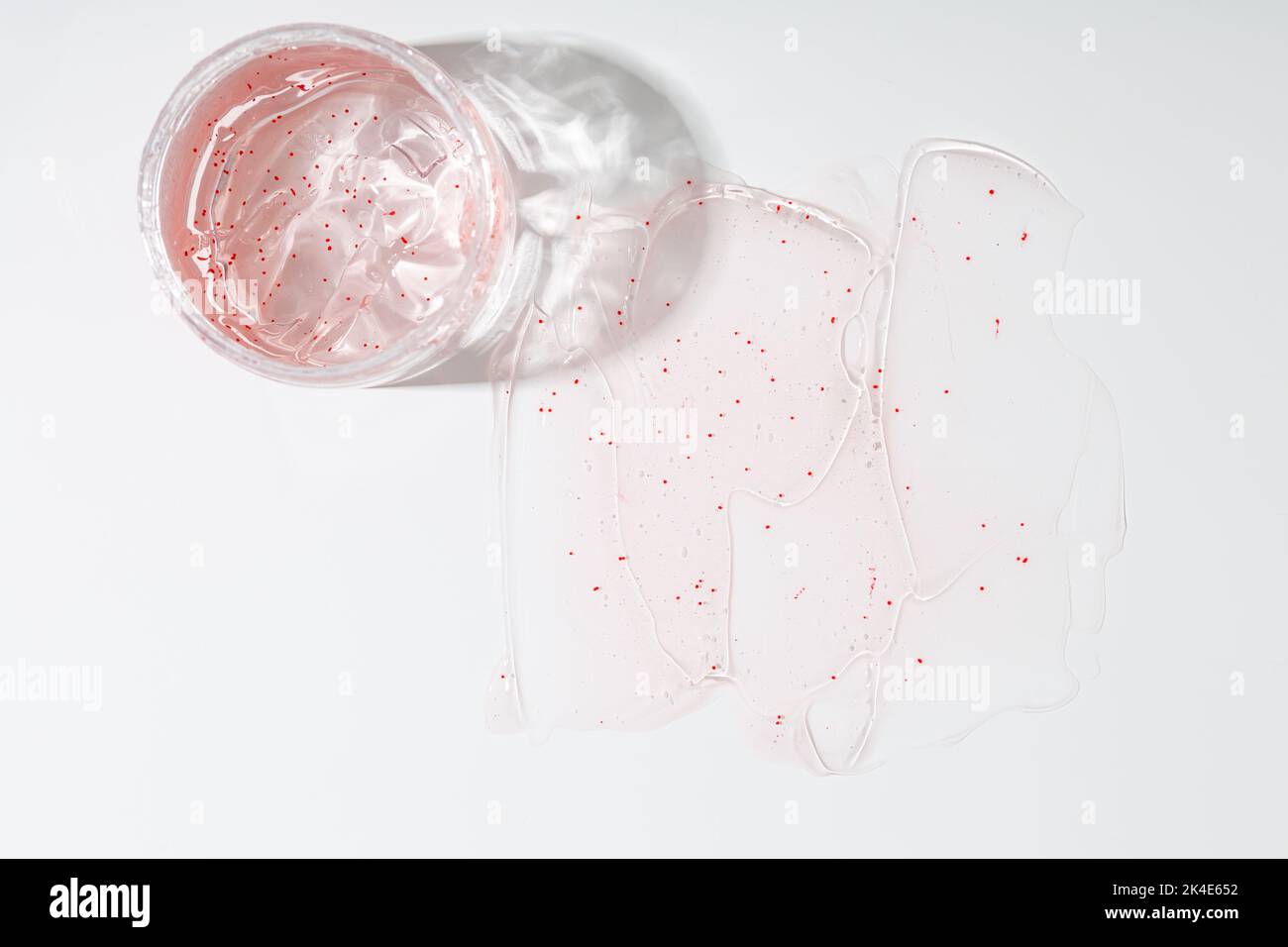 Skin care concept moisturising gel with exfoliating particles in jar ...