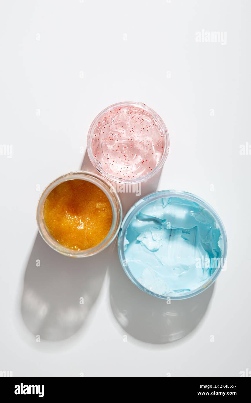 Top view of several jar with skin care cosmetics product cream scrub ...