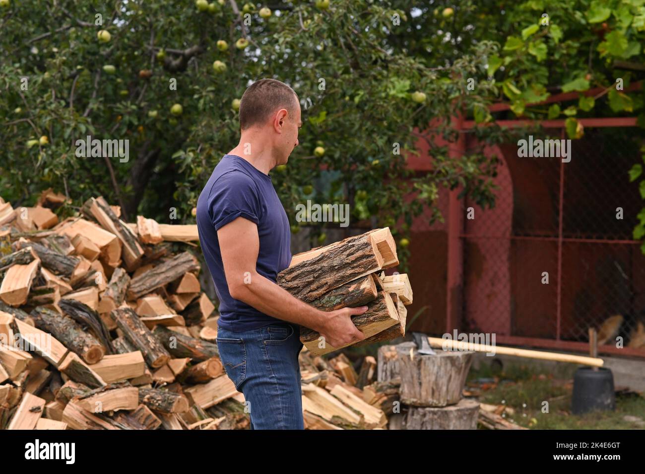 Man hands chopping wood hi-res stock photography and images - Alamy