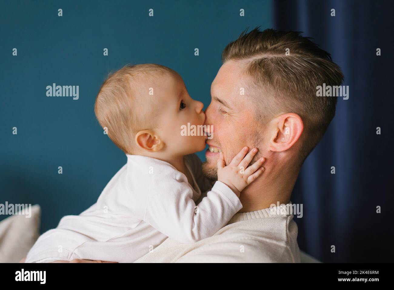 Baby laying with father chest hi-res stock photography and images - Alamy