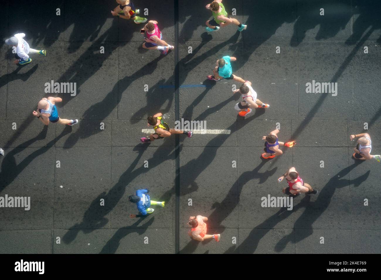 Runners cross Tower Bridge during the TCS London Marathon. Picture date ...