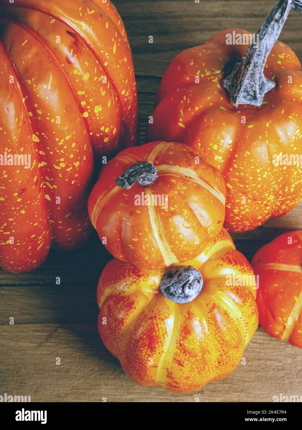 Some mock-up pumpkins on wooden table. Moody Style. Halloween concept ...