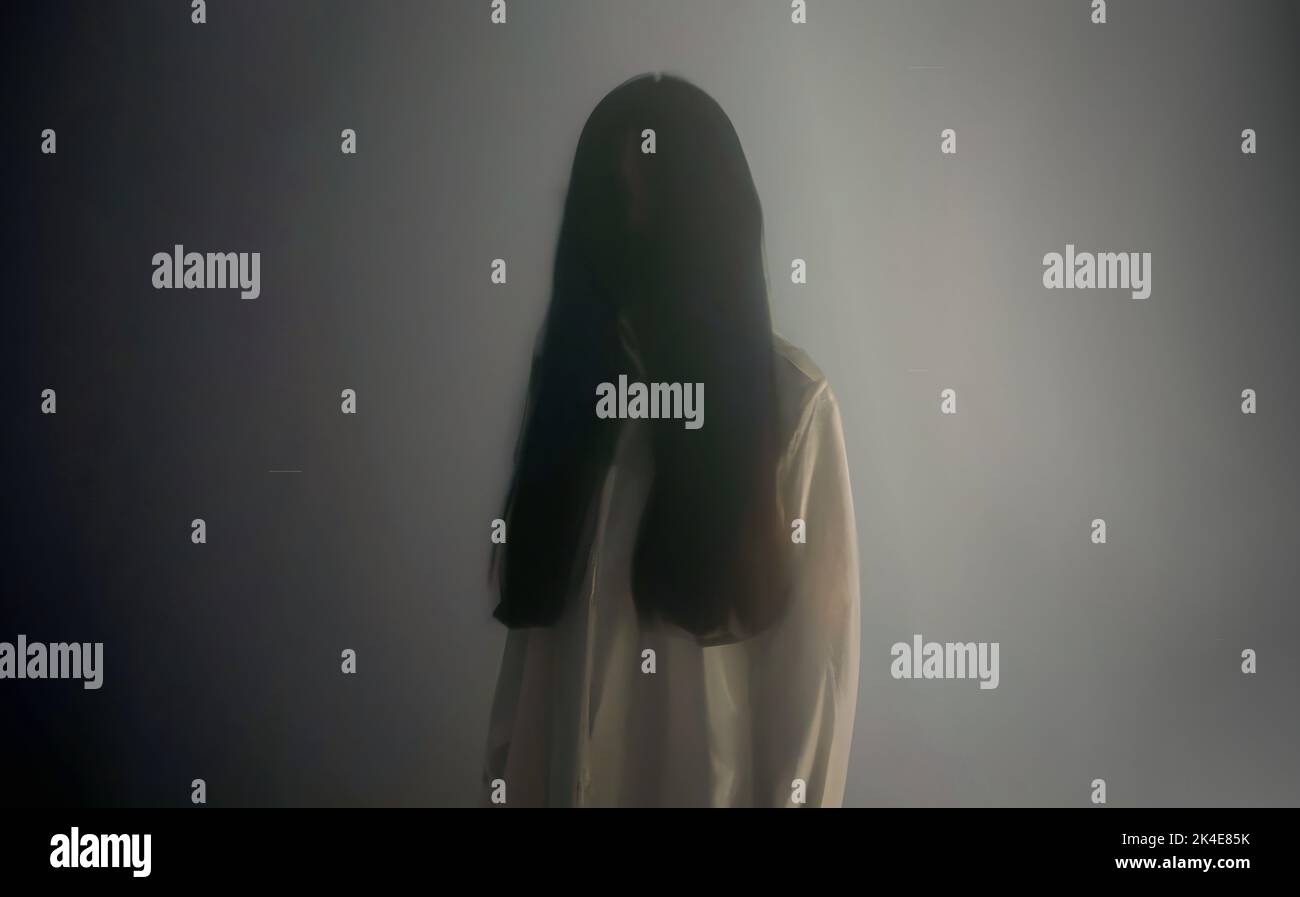 The faint appearance of A ghostly silhouette of a white faceless Asian ...