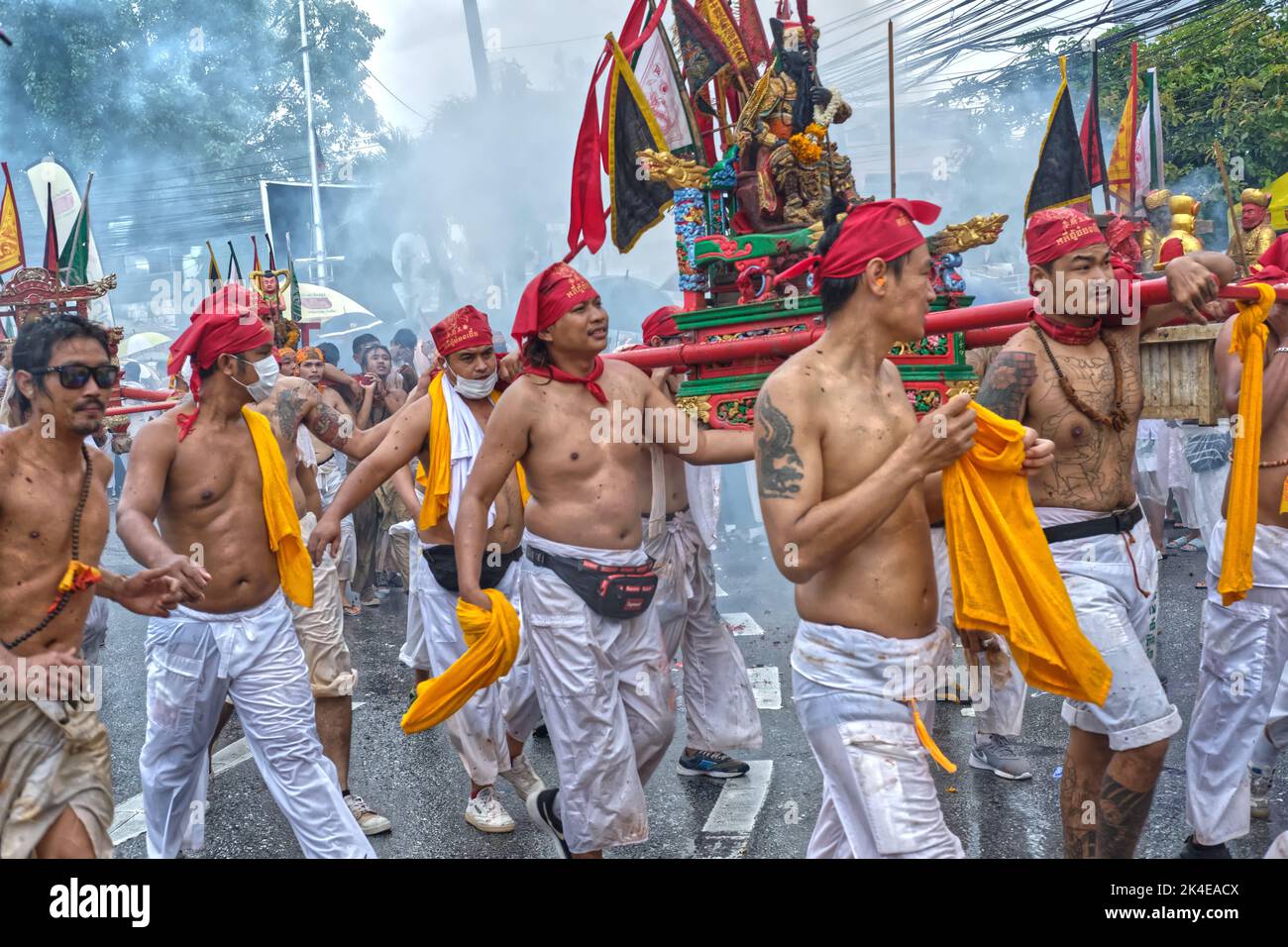 Palanquin bearers in a procession during the Vegetarian Festival (Nine ...