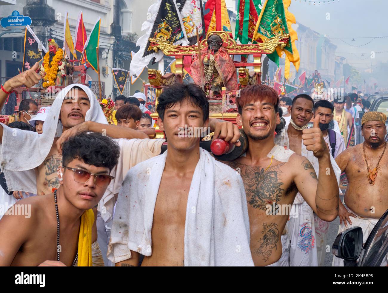 Palanquin bearers in a procession during the Vegetarian Festival (Nine ...