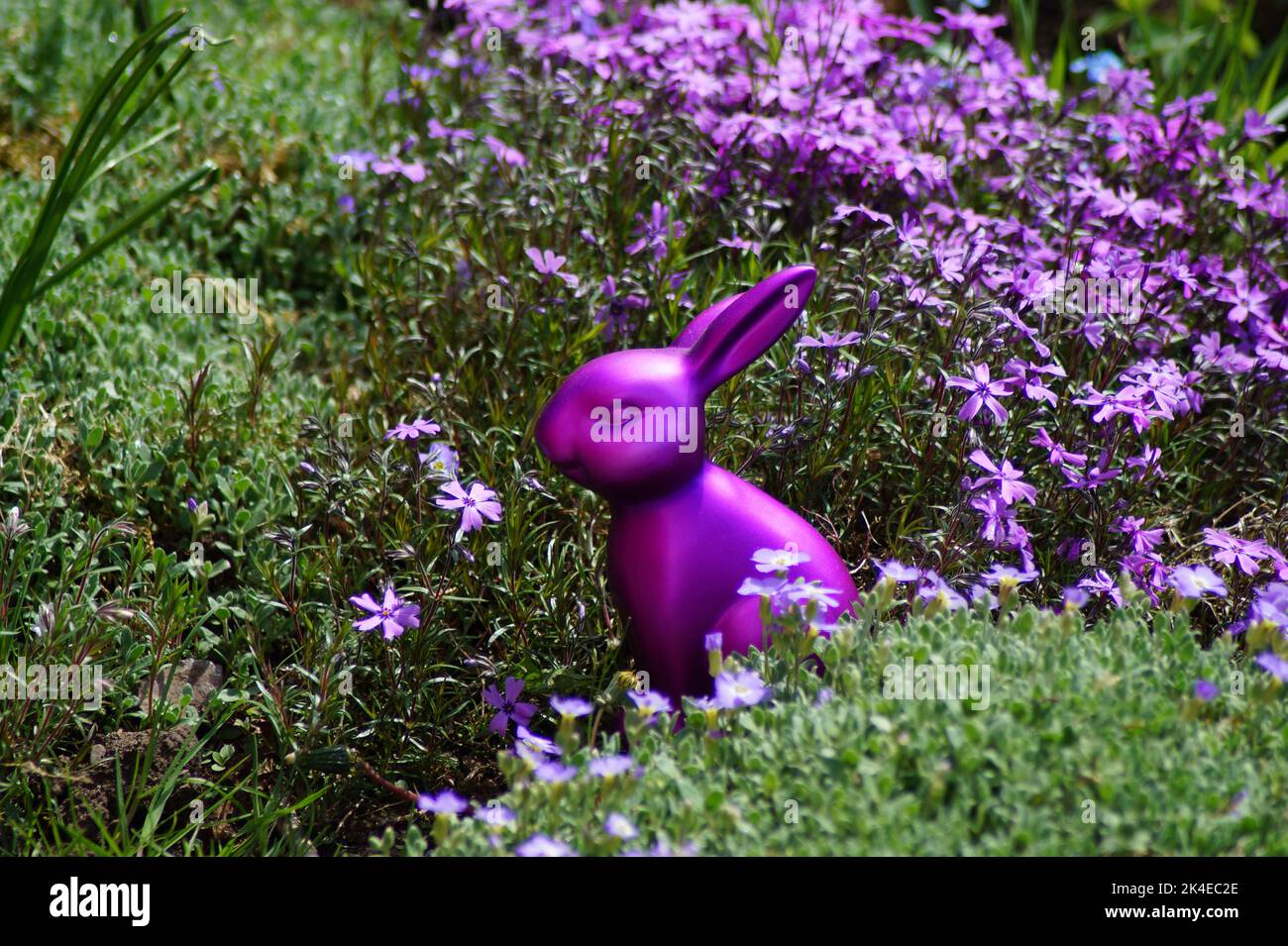 Rabbits, Deco Rabbits hide in the garden Stock Photo - Alamy