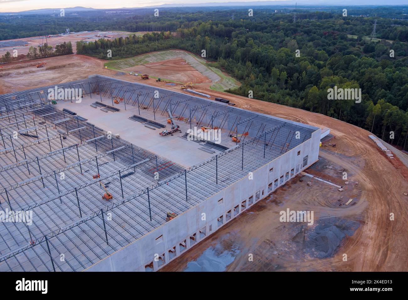 During the construction of a steel warehouse, the roof truss frame was ...
