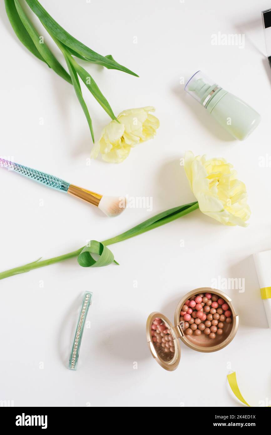 Decorative flatlay composition with make up products, cosmetics and ...