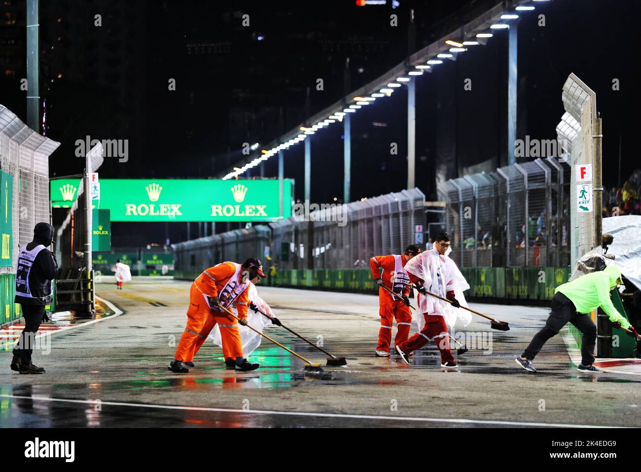 Singapore, Singapore. 02nd Oct, 2022. Circuit atmosphere - marshals sweep the circuit of rain ...