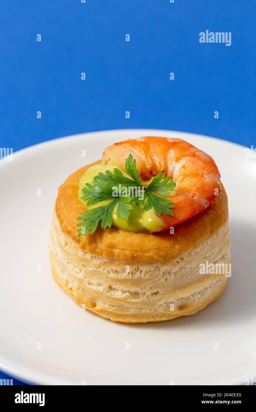 vol au vent with fish on blue background Stock Photo - Alamy
