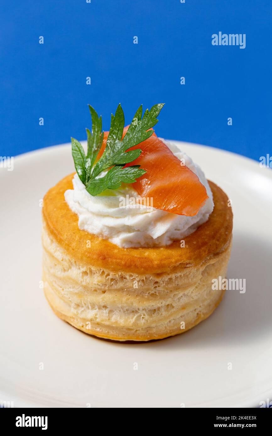 vol au vent with fish on blue background Stock Photo - Alamy
