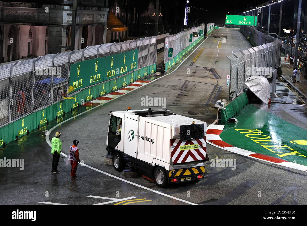 Singapore, Singapore. 02nd Oct, 2022. Circuit atmosphere - marshals sweep the circuit of rain ...