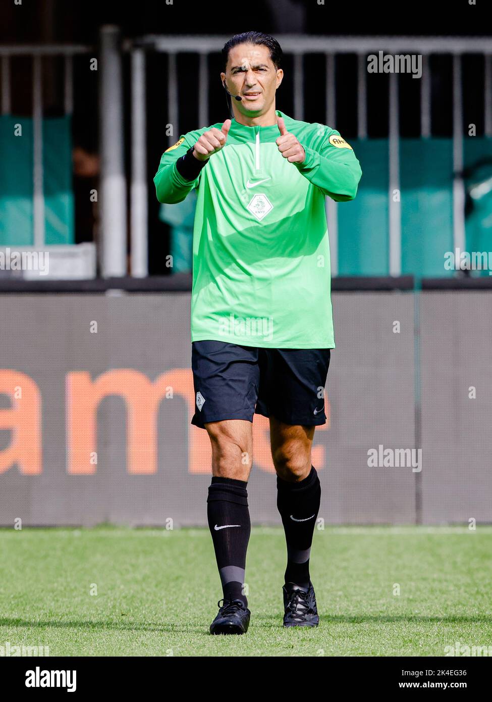 NIJMEGEN, NETHERLANDS - OCTOBER 2: Referee Serdar Gozubuyuk giving ...