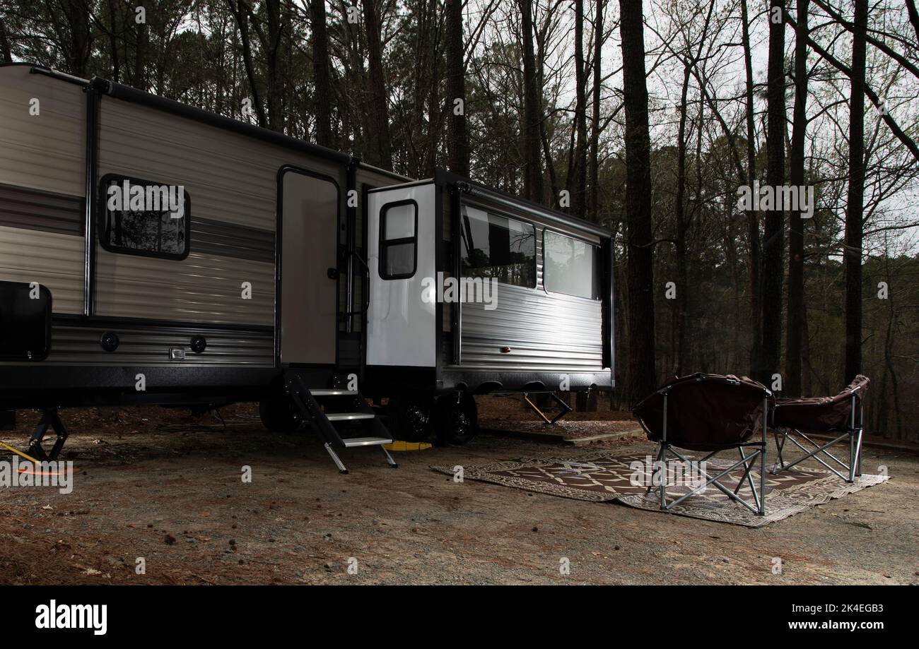 Empty camping trailer campsite in the forest at Jordan Lake in North ...