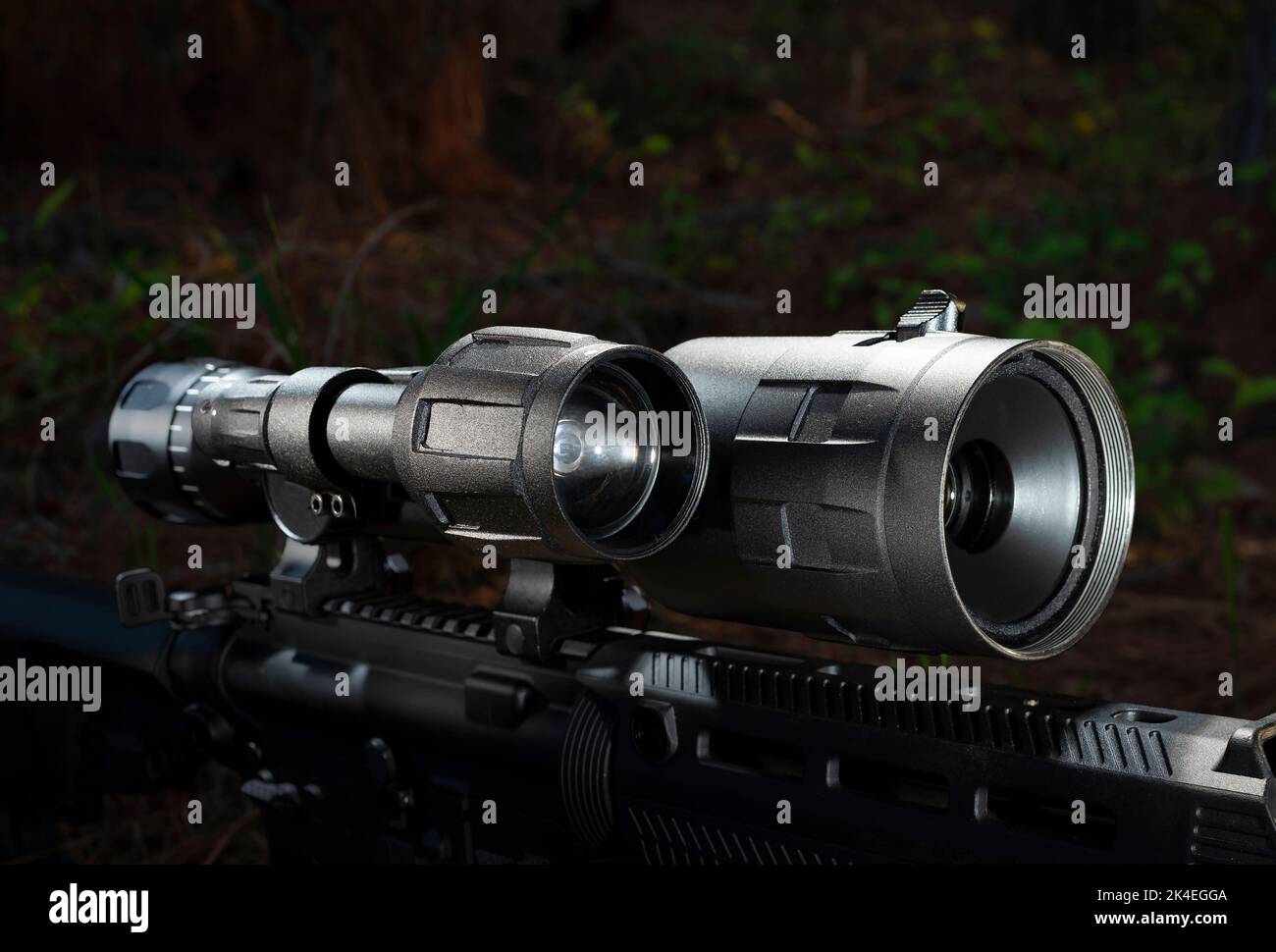 Infrared night vision scope on an assault rifle outdoors Stock Photo ...