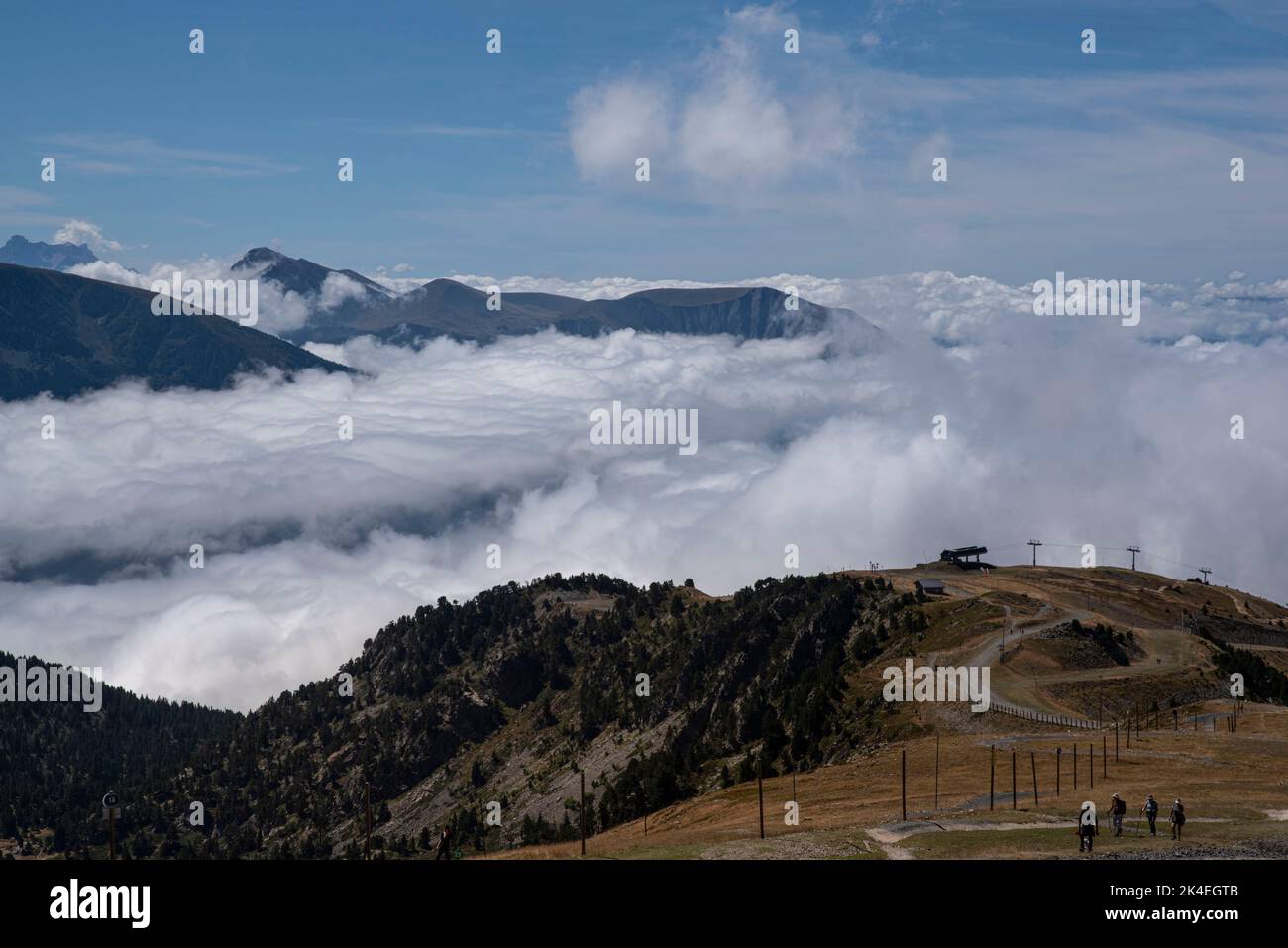Mountain landscape above the clouds at the top of the Chamrousse ...