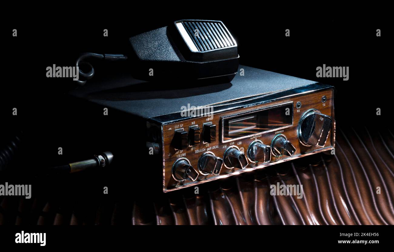 Microphone and CB radio on a wavy bronze background Stock Photo - Alamy
