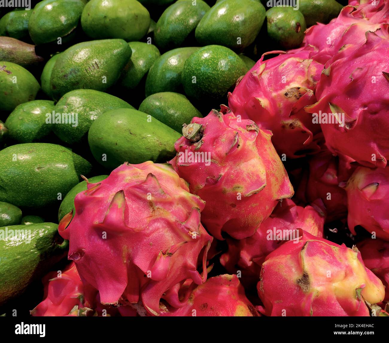 Fresh avocado and dragon fruit in the market Stock Photo - Alamy