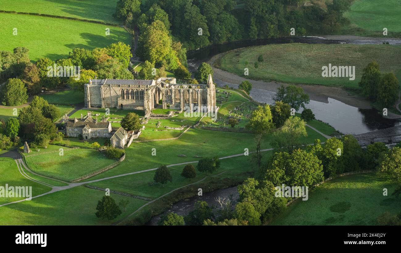 Early morning sunshine illuminates Bolton Abbey in Wharfedale, North ...