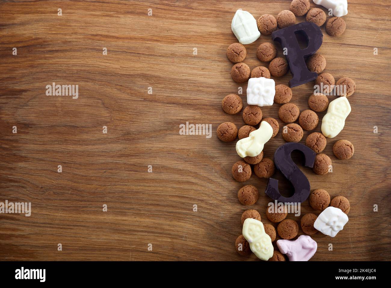 Saint Nicholas - Sinterklaas day. Traditional sweets on wooden ...