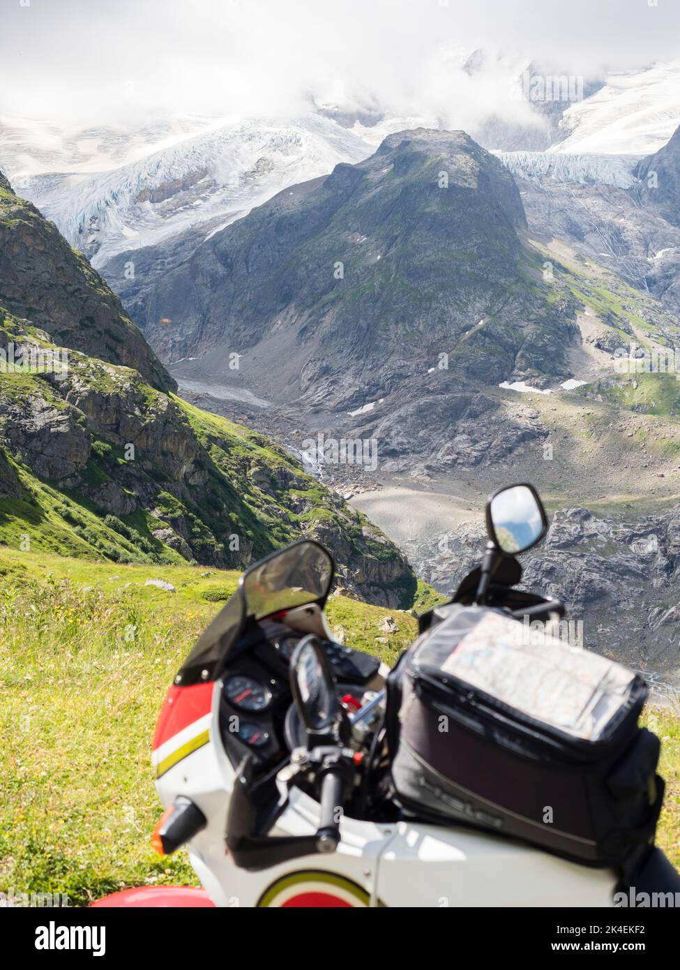 Tank bag with map on an adventure motorcycle at a mountain pass in the ...