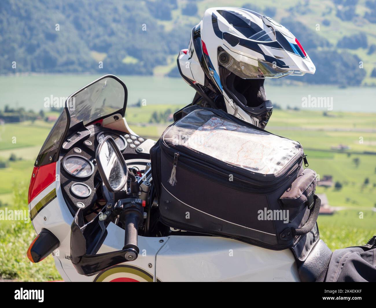 Tank bag with map on an adventure motorcycle at a mountain pass in the ...