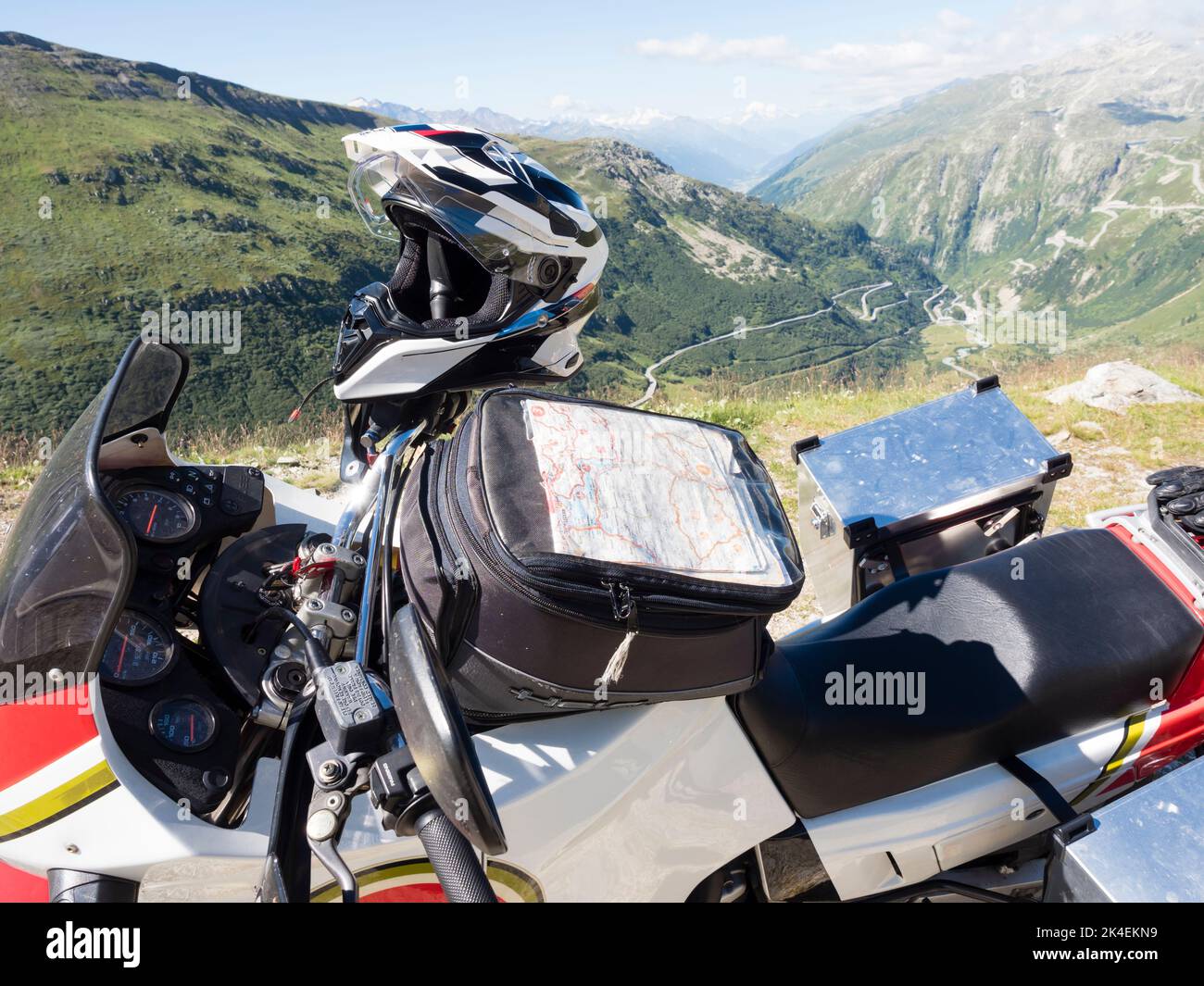 Tank bag with map on an adventure motorcycle at a mountain pass in the ...