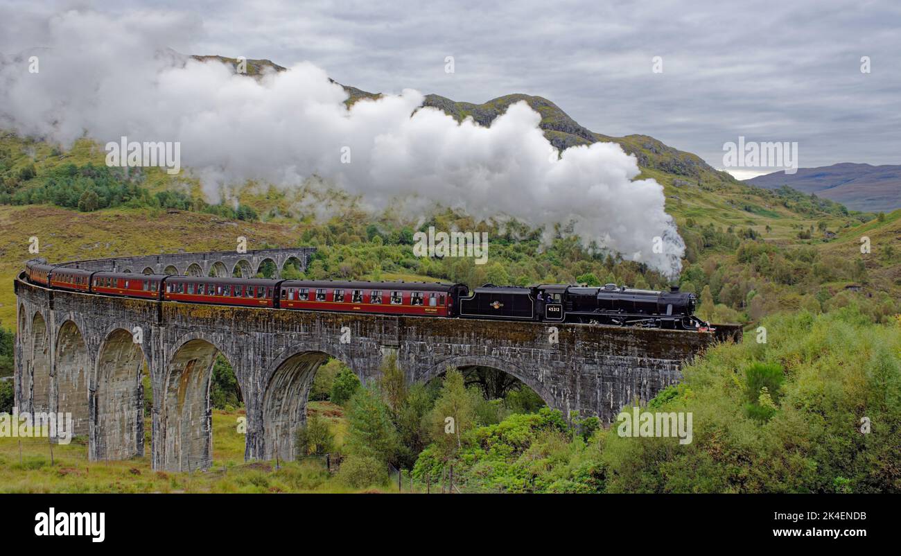 JACOBITE STEAM TRAIN GLENFINNAN VIADUCT SCOTLAND THE ENGINE CROSSING ...