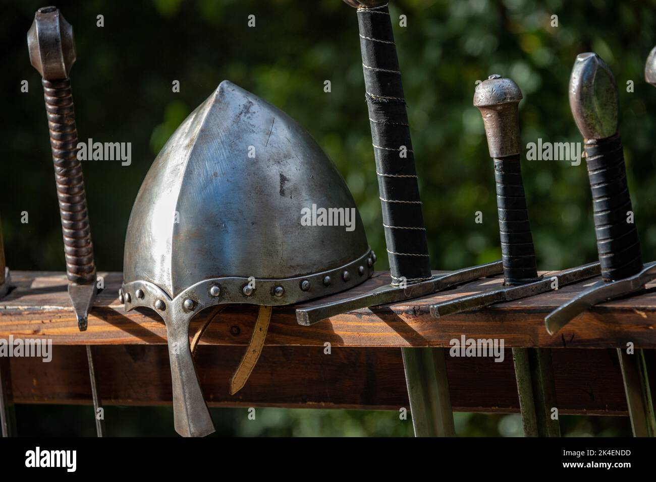 viking helmet and swords in a viking camp ,historical re enactment ...