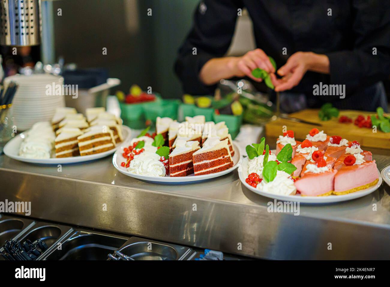 Buffet with slides of pies and cakes prepared by the cook for a party ...