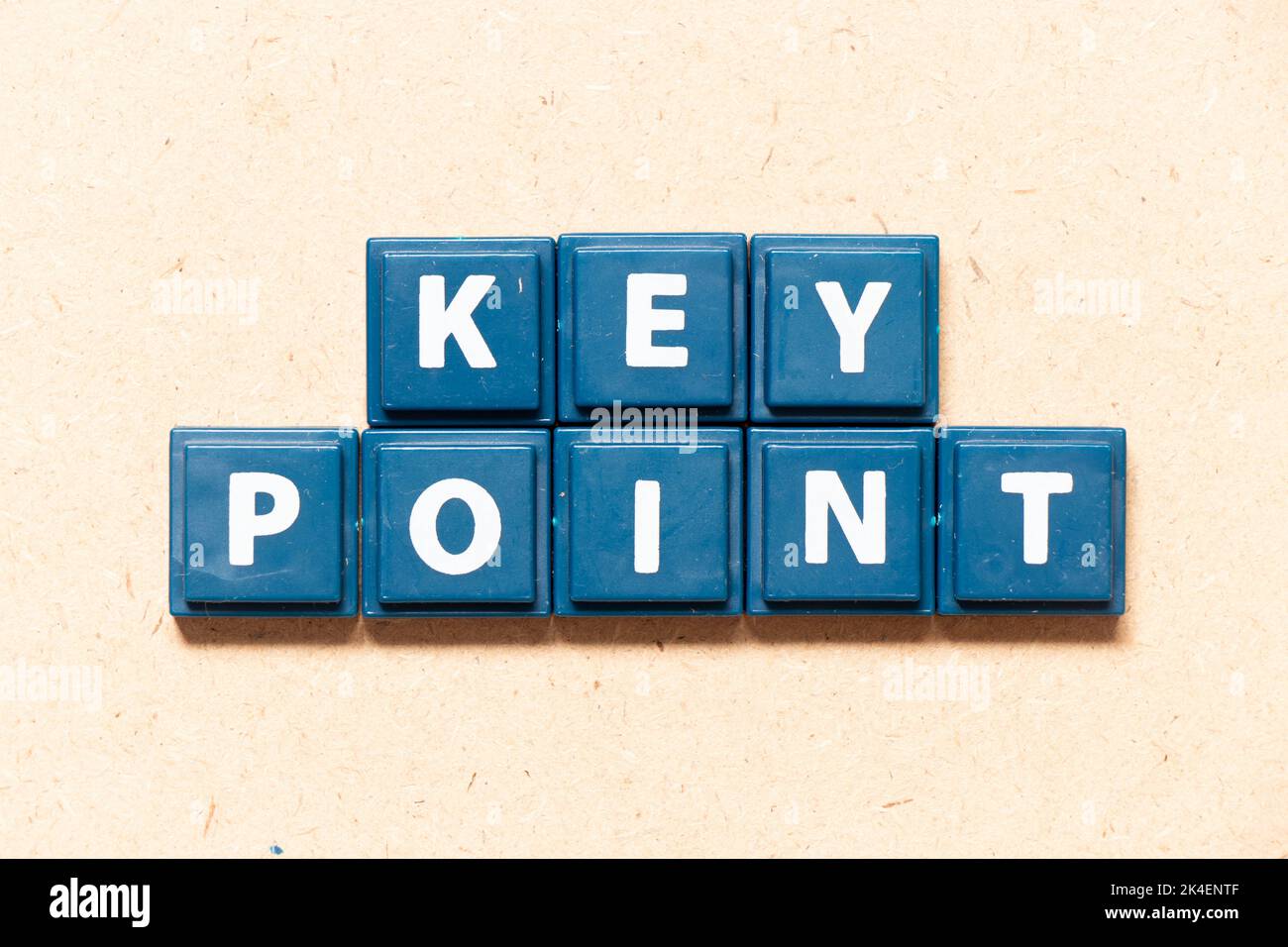 Tile letter in english word key point on wood background Stock Photo ...