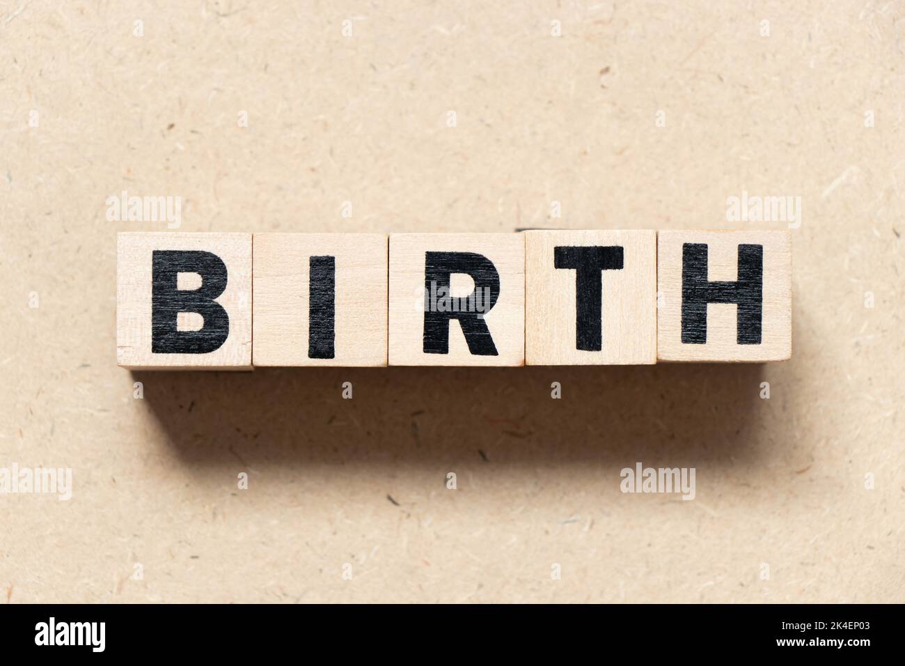 Alphabet letter block in word birth on wood background Stock Photo - Alamy