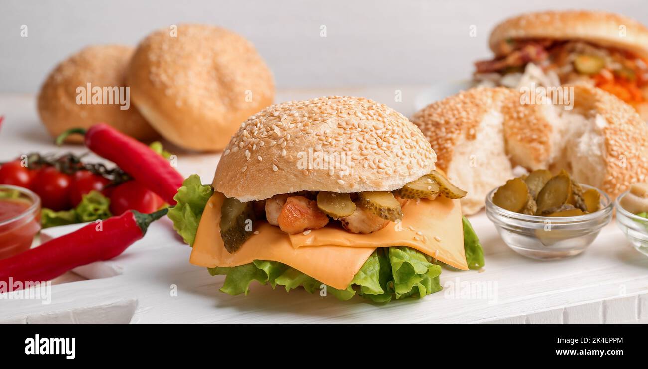 Tasty doner kebab in bun on table Stock Photo - Alamy