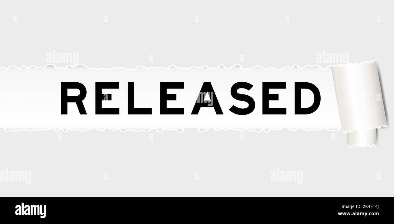 Ripped gray paper background that have word released under torn part ...