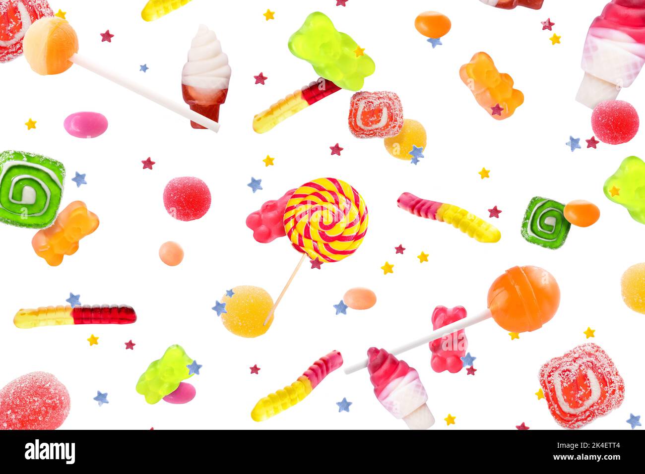 Many flying candies on white background Stock Photo - Alamy