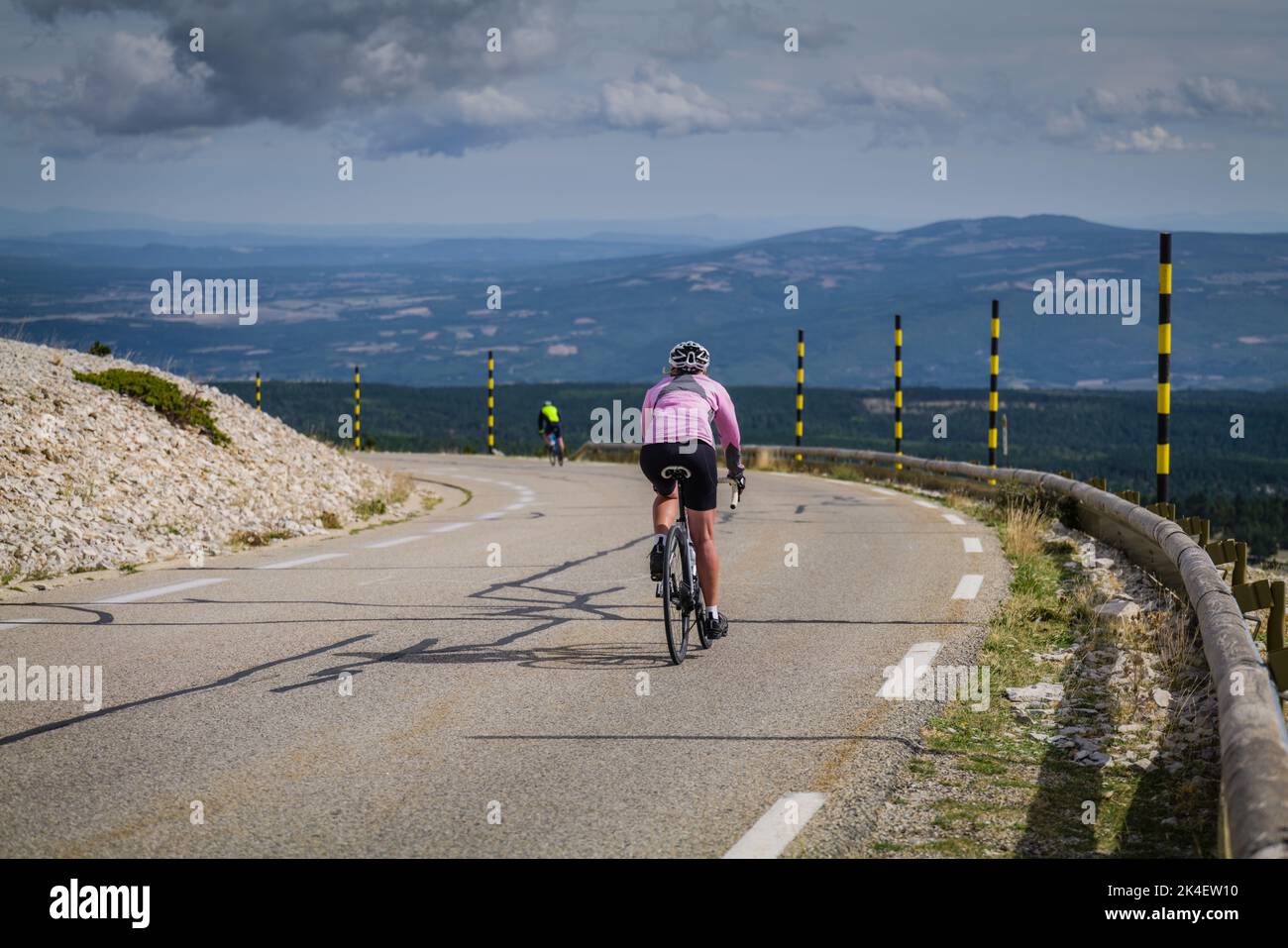 Female road cyclist descending Mont Ventoux, Provence, France Stock ...
