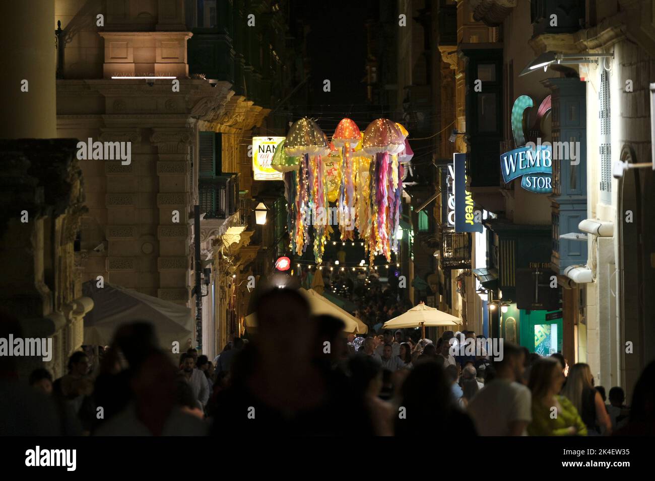 People during night walk hi-res stock photography and images - Alamy