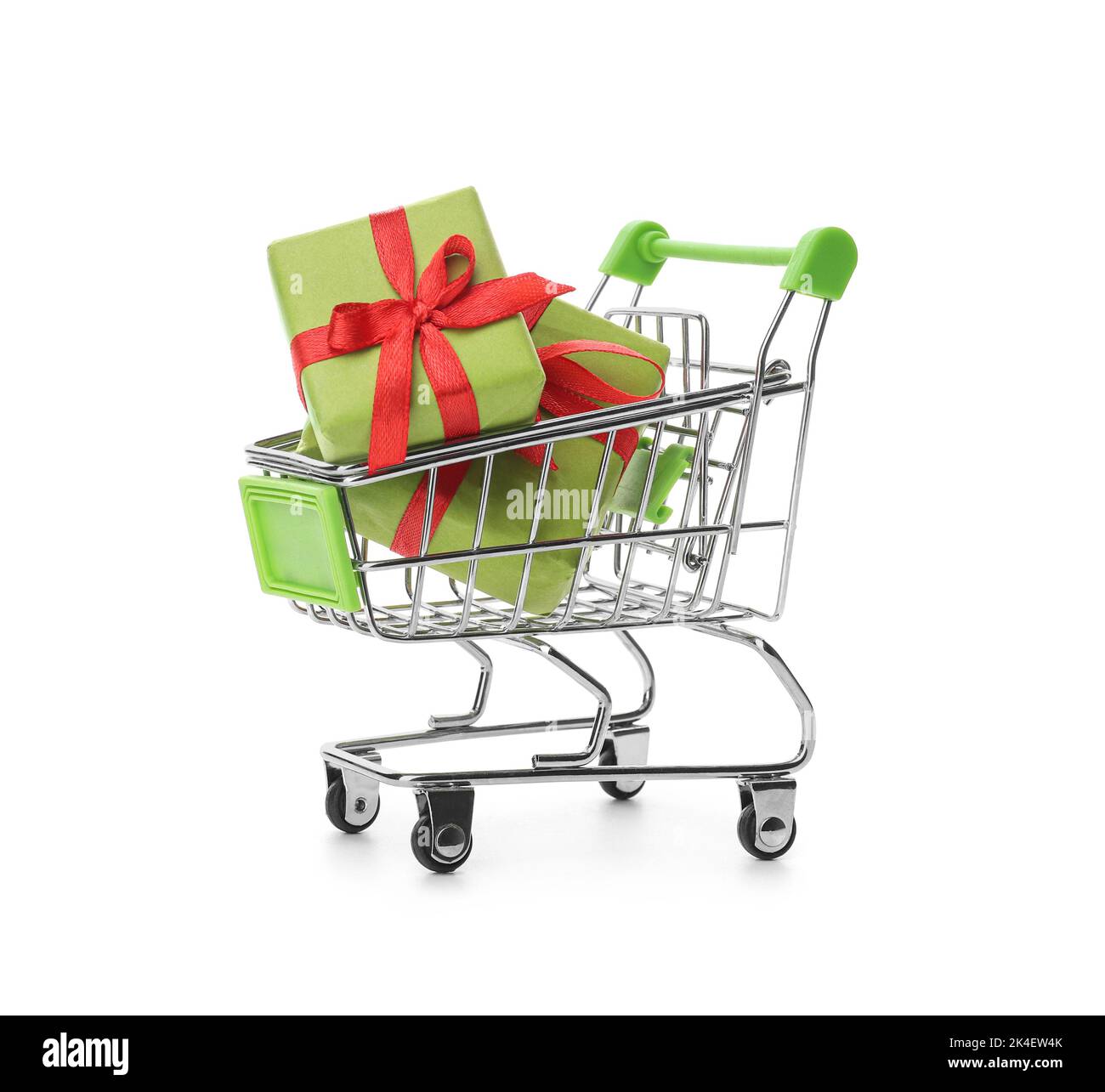 Shopping cart with gift boxes on white background Stock Photo - Alamy