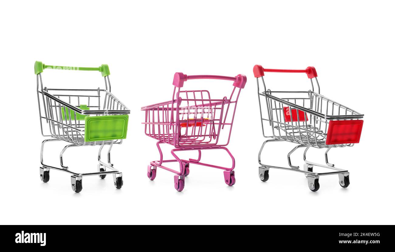 Different empty shopping carts on white background Stock Photo - Alamy
