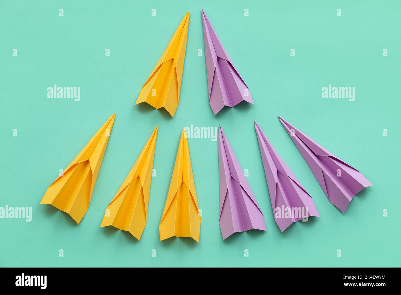 Colorful paper planes on blue background Stock Photo - Alamy
