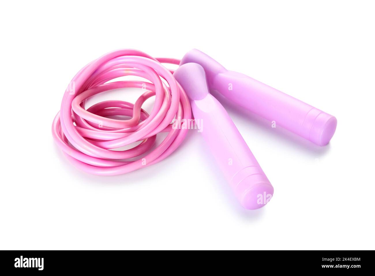 Pink skipping rope on white background Stock Photo - Alamy