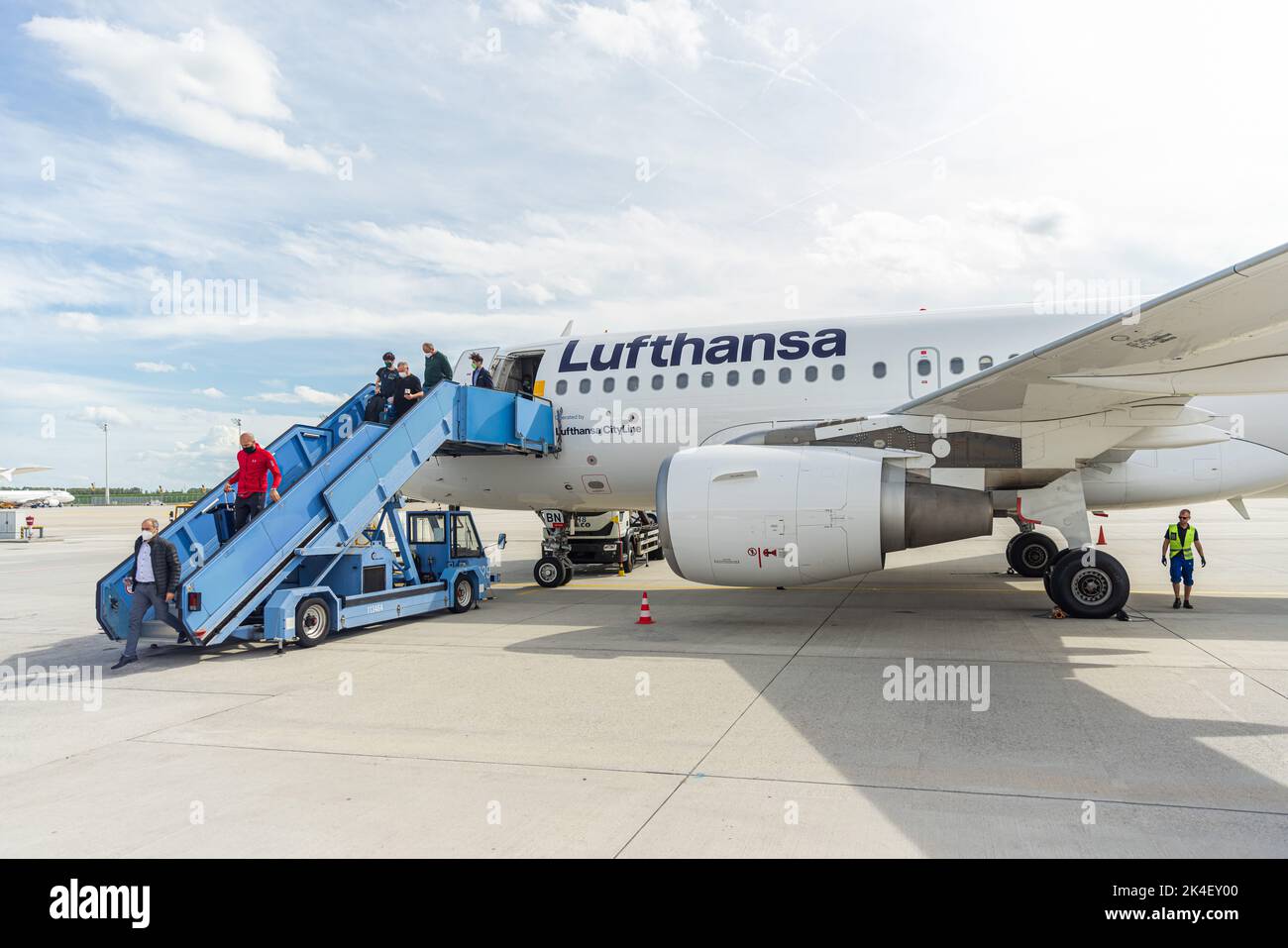 MUNICH, GERMANY - SEPTEMBER 14, 2022: People deboarding Lufthansa ...