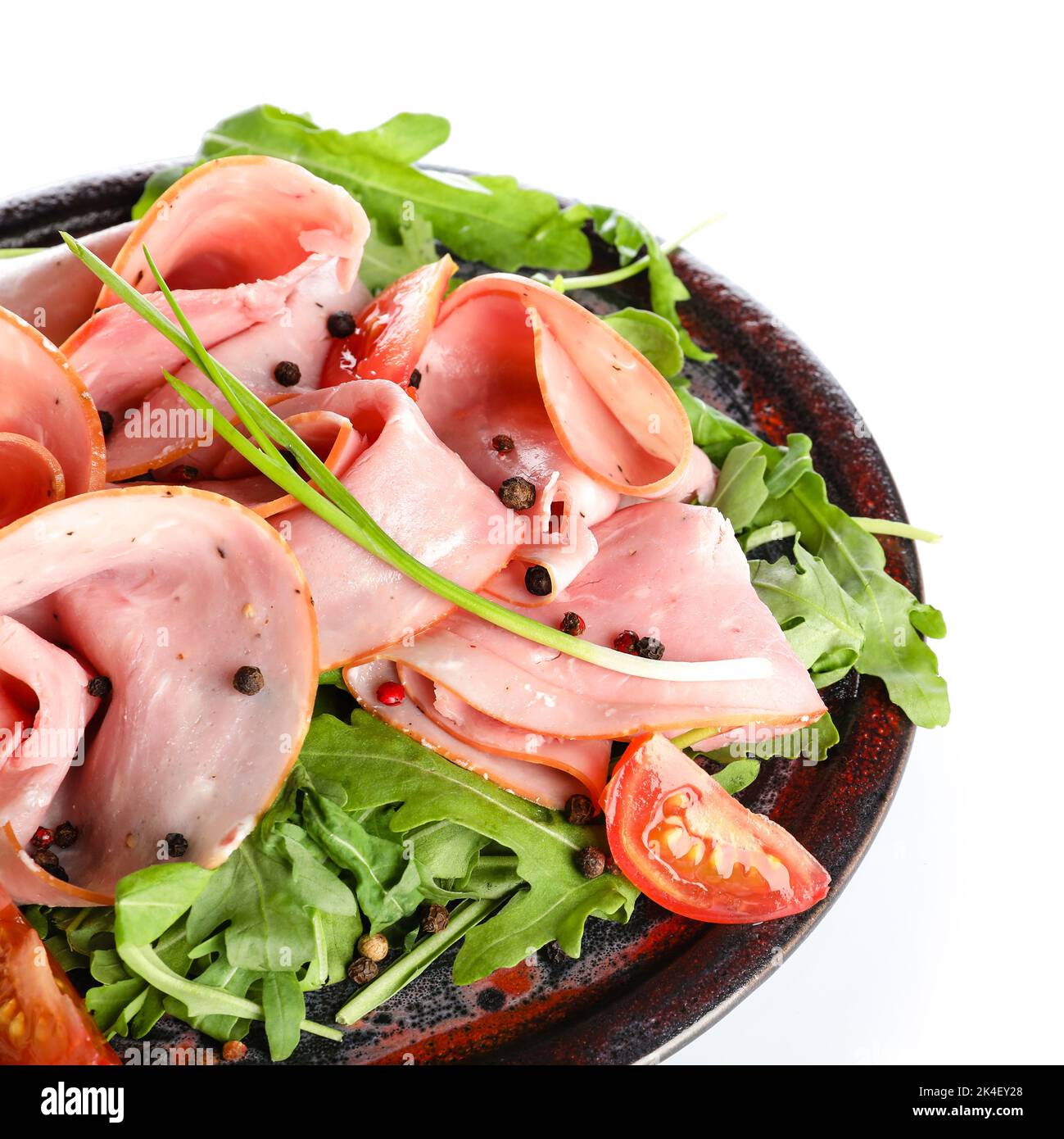 Plate with sliced ham isolated on white background, closeup Stock Photo ...
