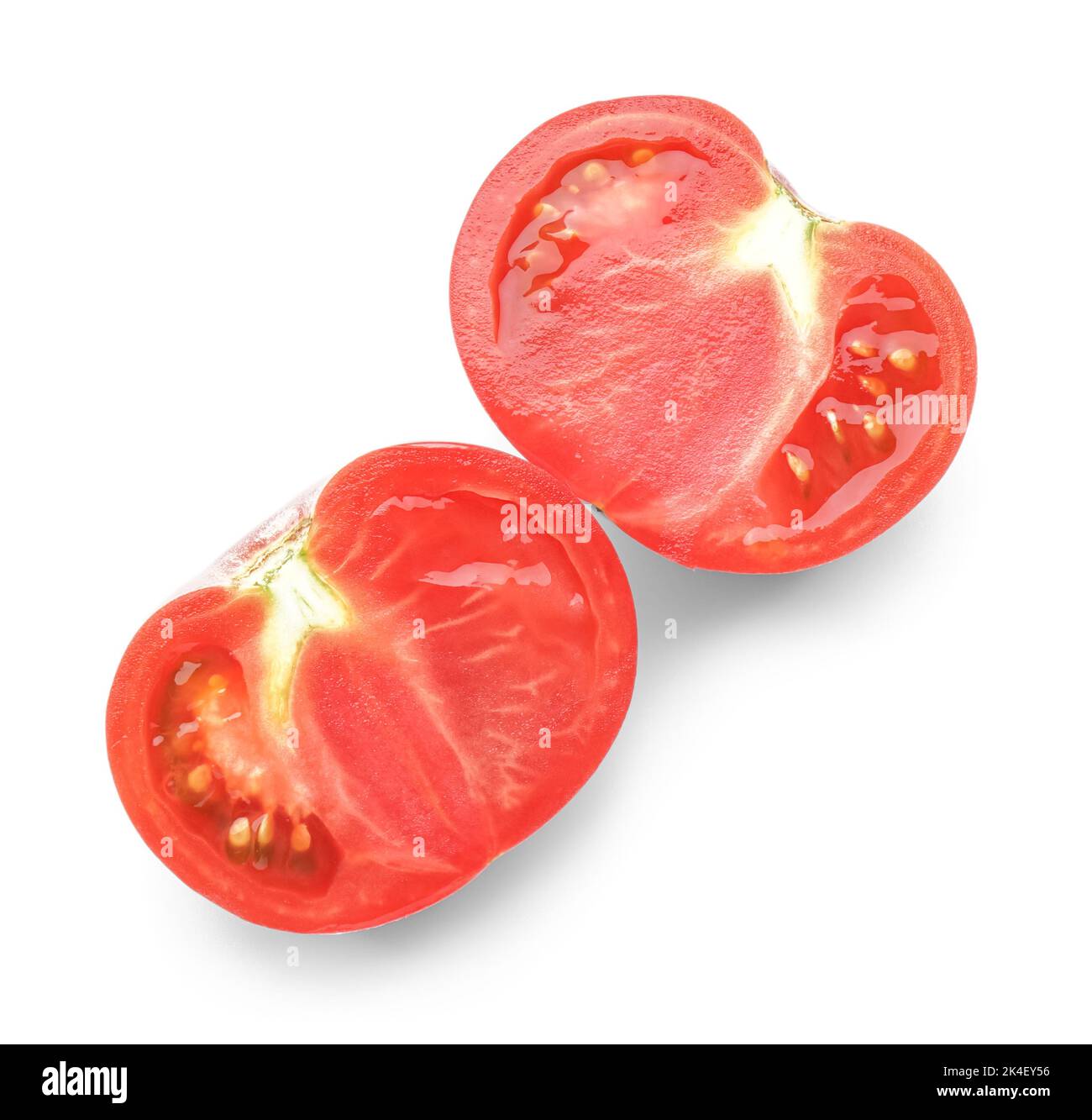 Halves of ripe tomato on white background Stock Photo - Alamy
