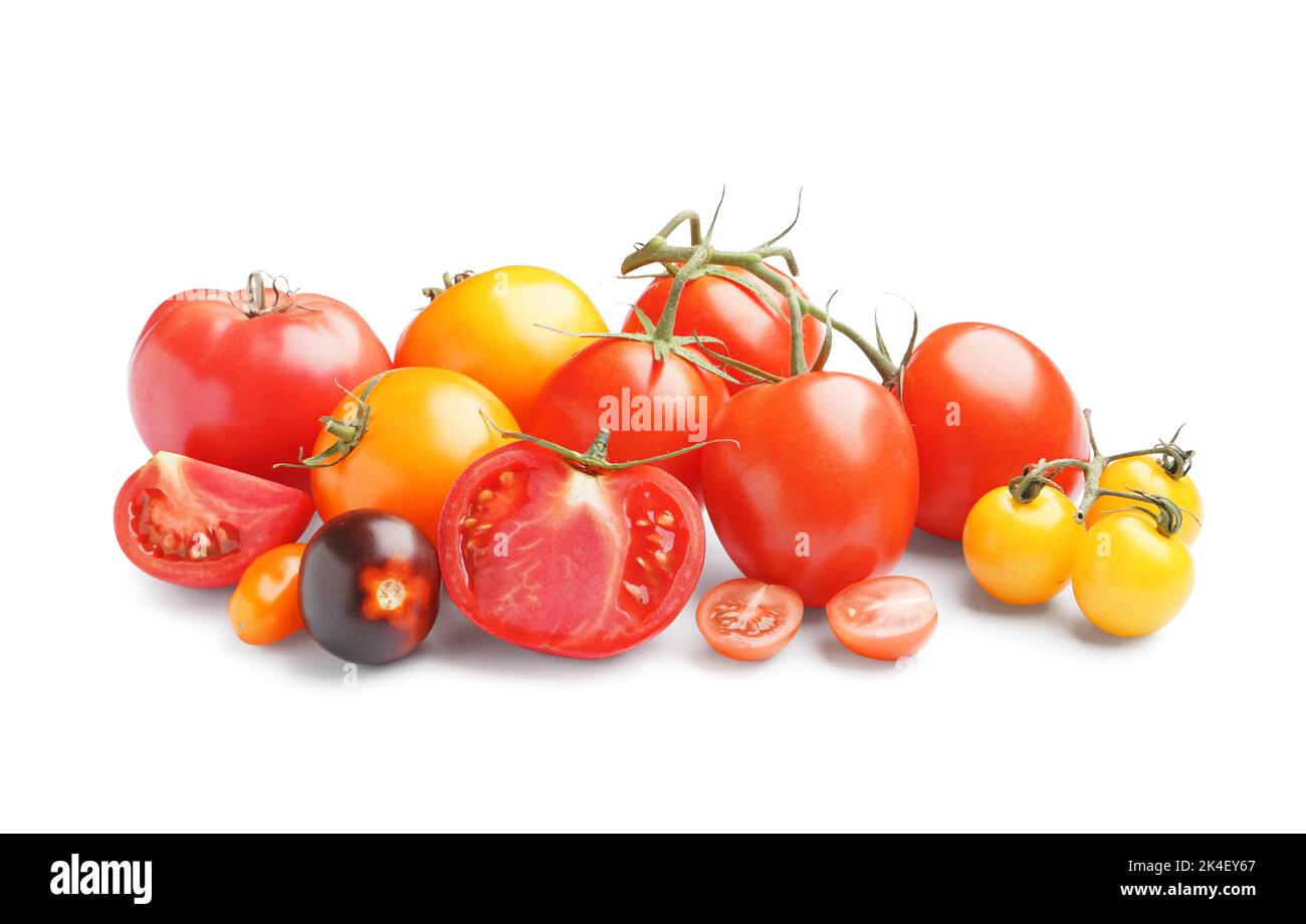 Heap of different tomatoes on white background Stock Photo - Alamy