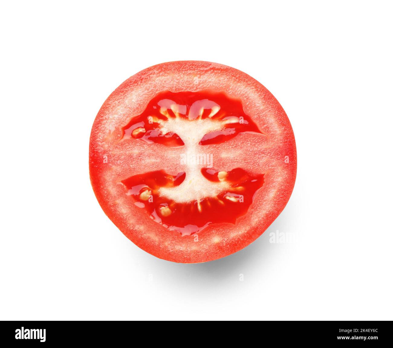 Half of ripe tomato isolated on white background Stock Photo - Alamy