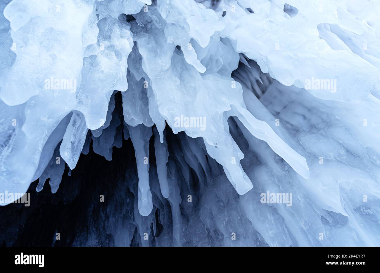 Blue ice and icicles on the rocks of Ogoy island, Baikal lake, Siberia ...